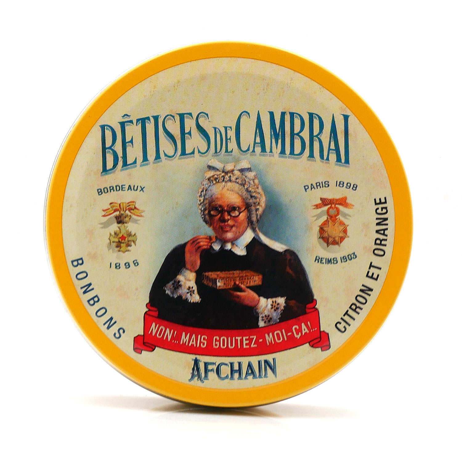 Bêtises de Cambrai au citron et à l'orange dans leur boîte ronde ...